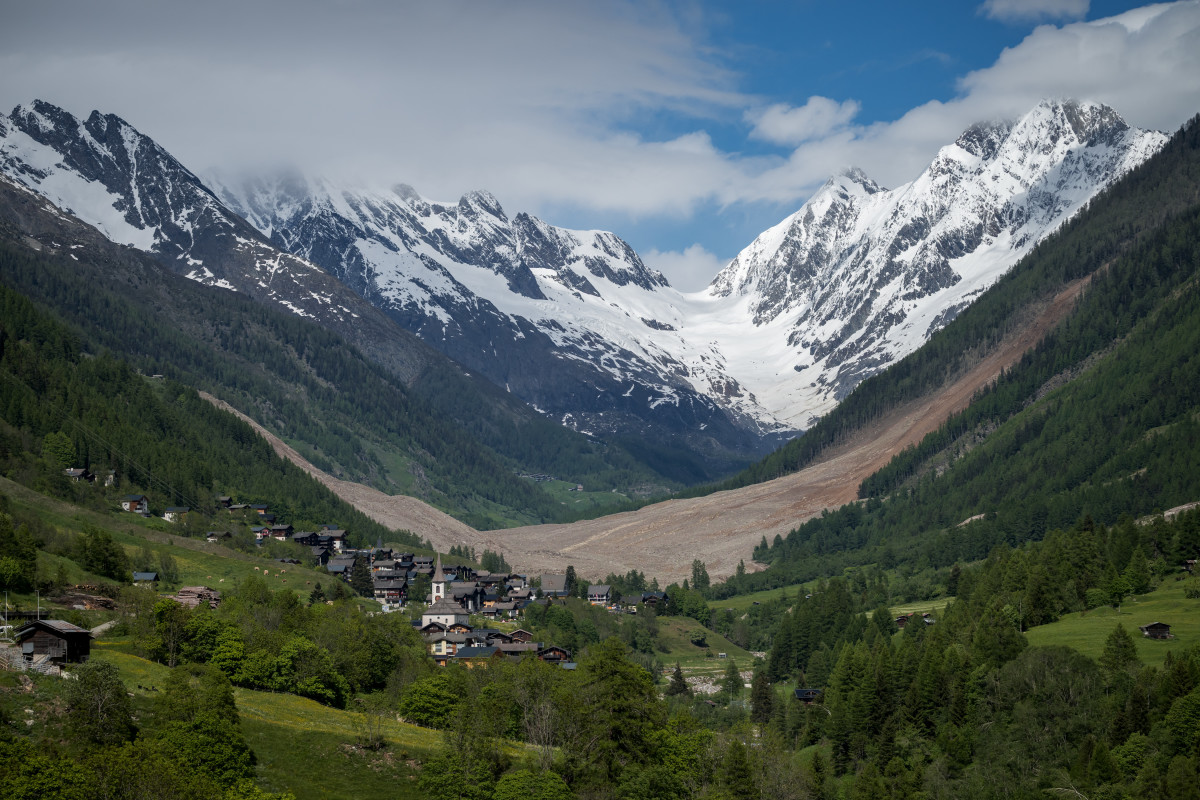 Striking Satellite Images Show Swiss Village Buried by Landslide