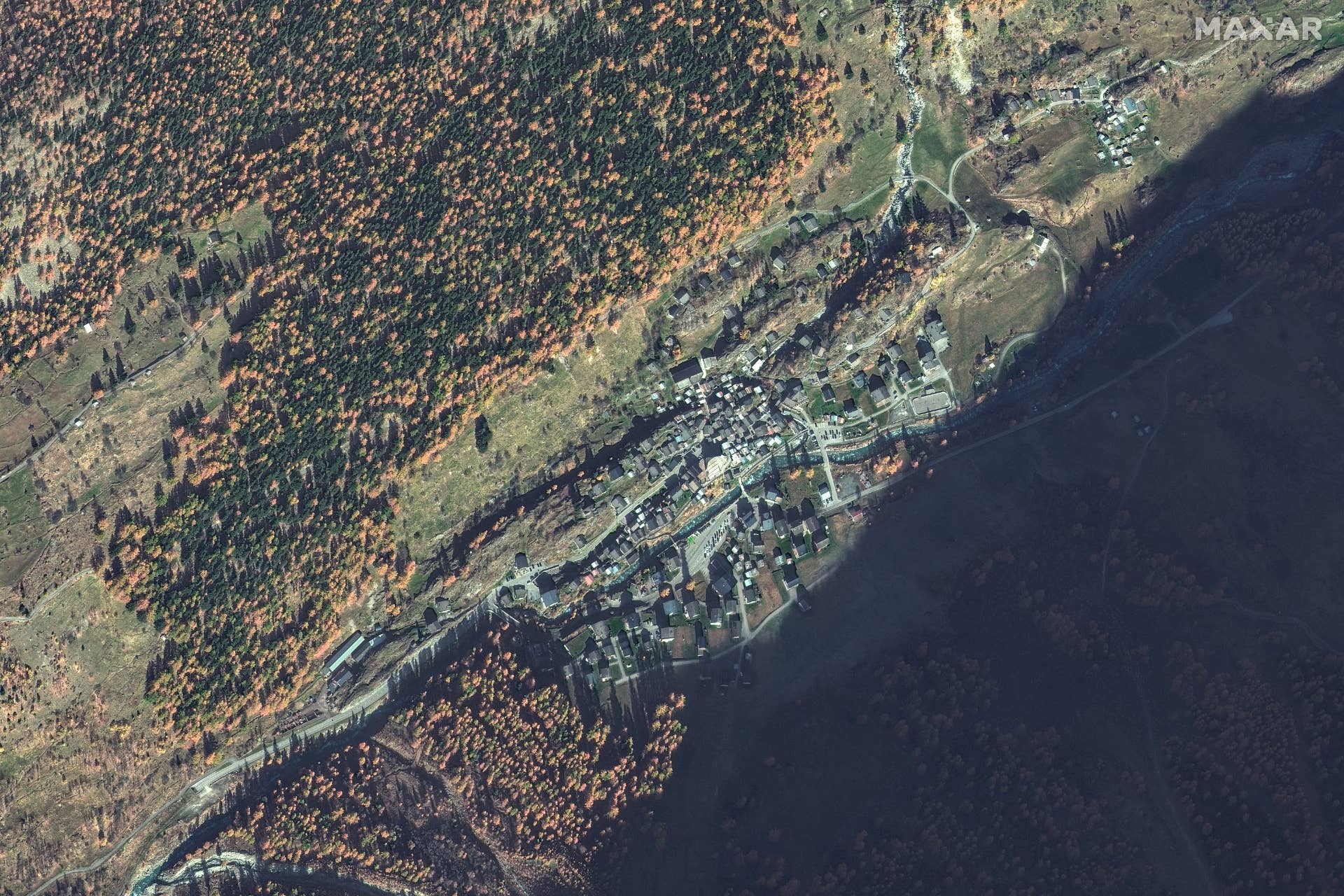 Striking Satellite Images Show Swiss Village Buried by Landslide